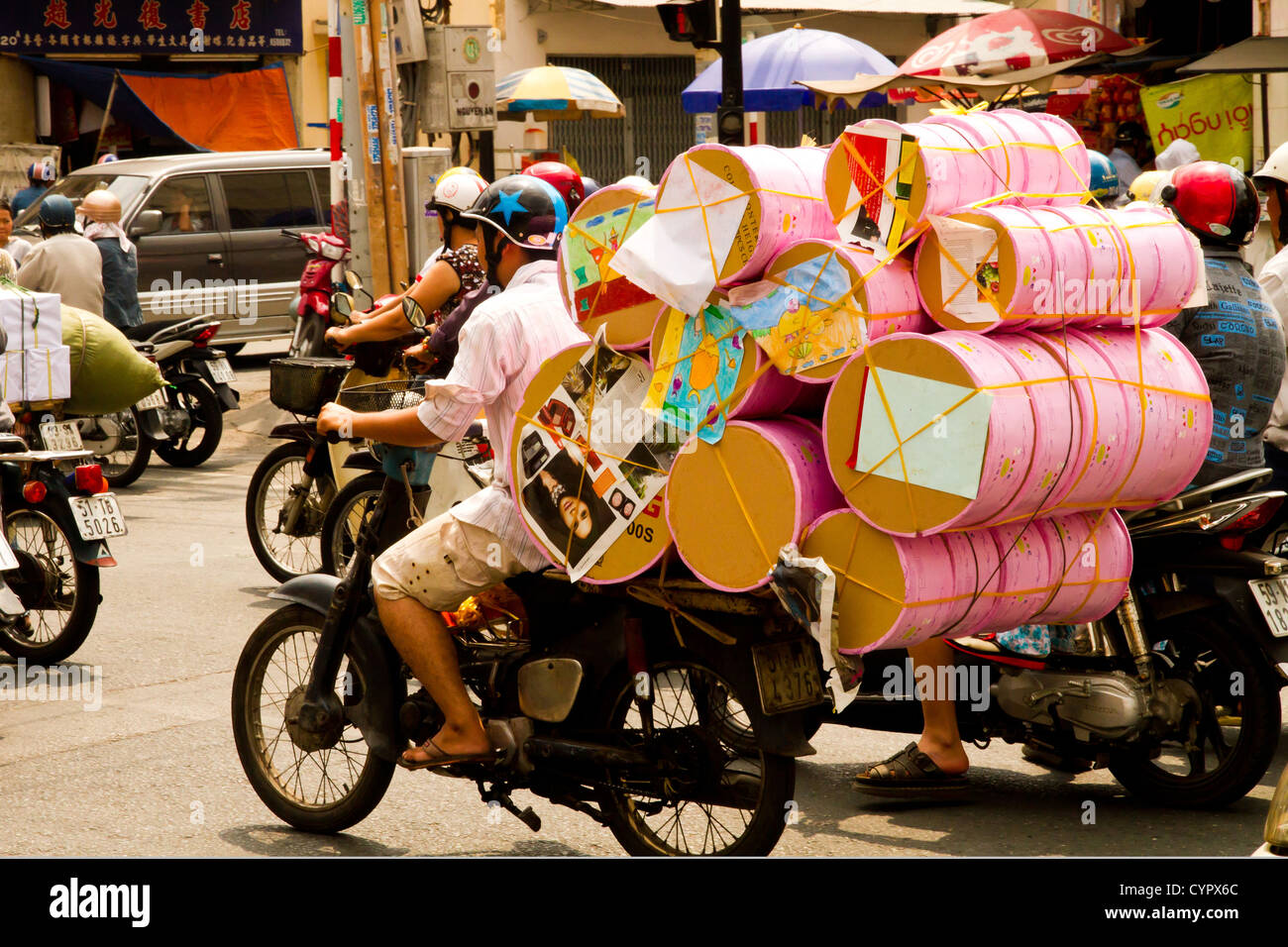 Motor bike with large load in Ho Chi Minh City Vietnam Stock Photo - Alamy