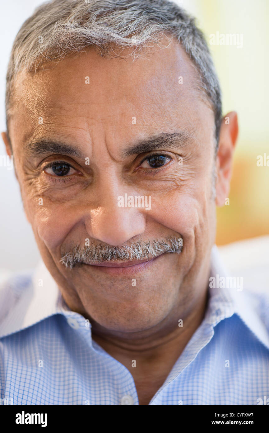 Smiling Hispanic man Stock Photo - Alamy