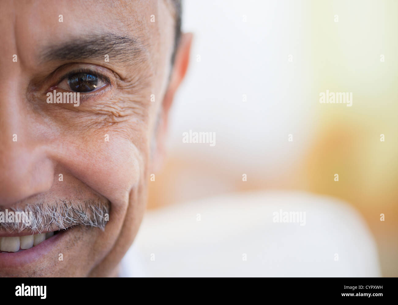 Smiling Hispanic man Stock Photo - Alamy