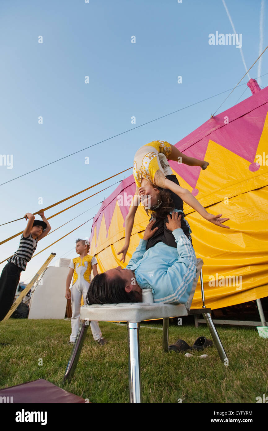 Circus performers practicing backstage at the annual Great CIrcus ...