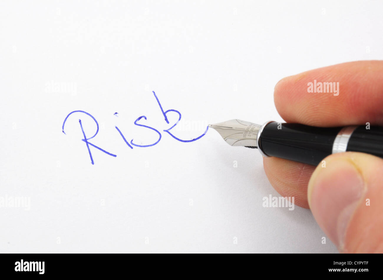 risk management concept with word on paper and pen Stock Photo - Alamy