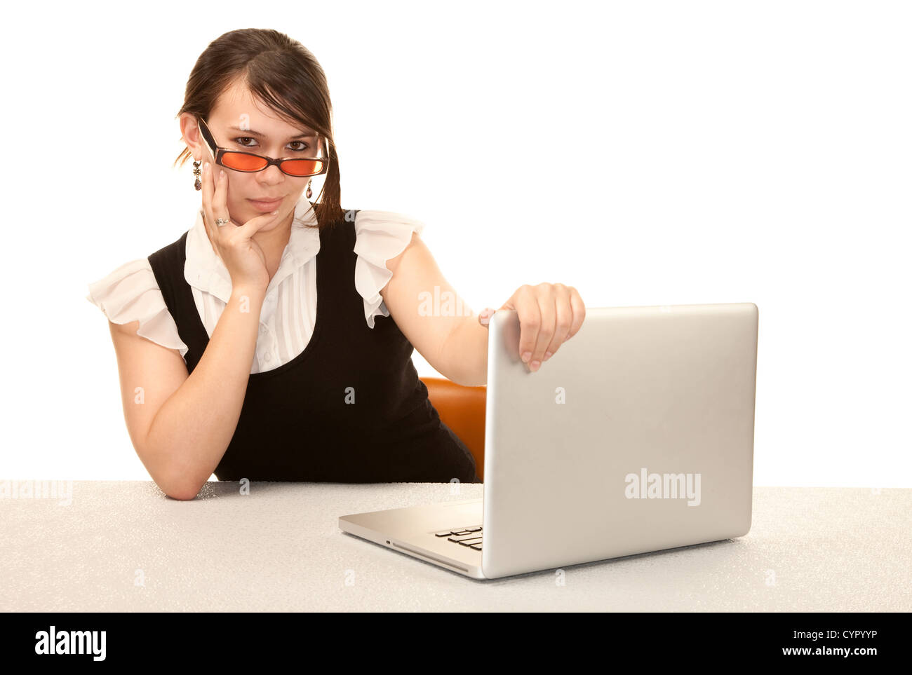 Pretty female office worker with laptop computer Stock Photo - Alamy