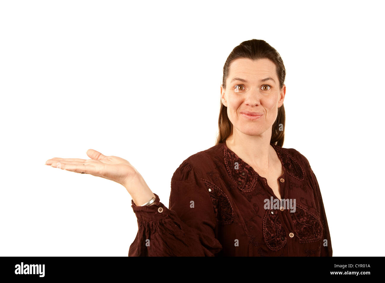 Pretty adult woman gesturing with the palm of her hand Stock Photo - Alamy