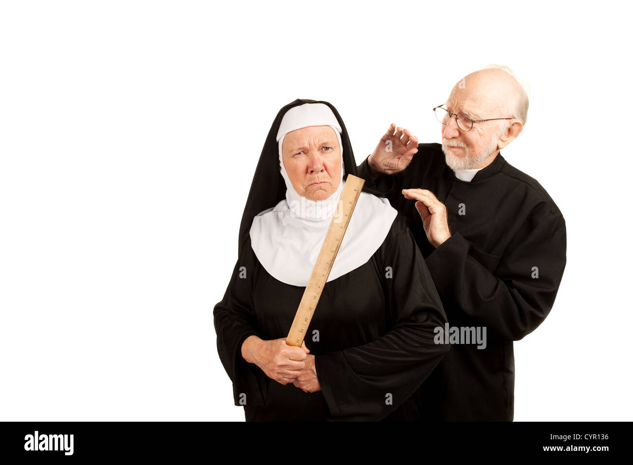 Funny priest and nun with ruler on white background Stock Photo - Alamy