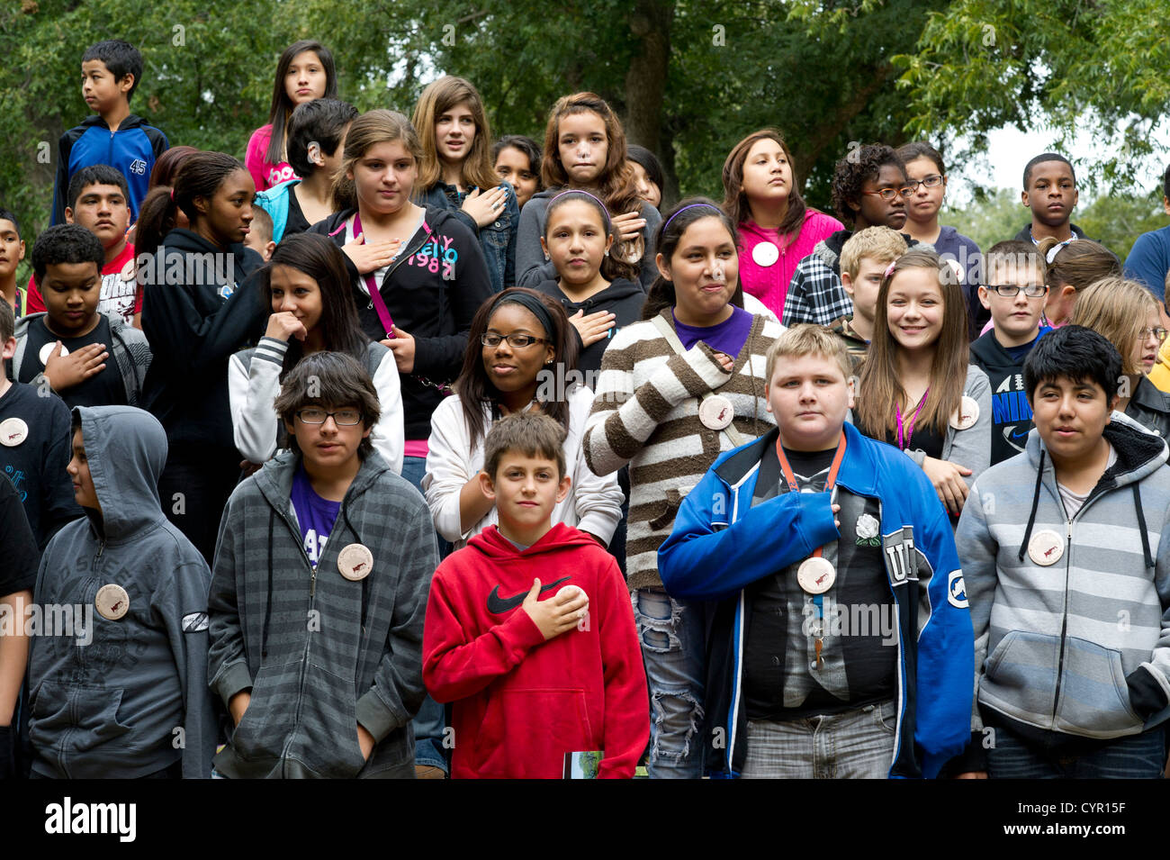 Multicultural group of Texas junior high school students recite Pledge ...