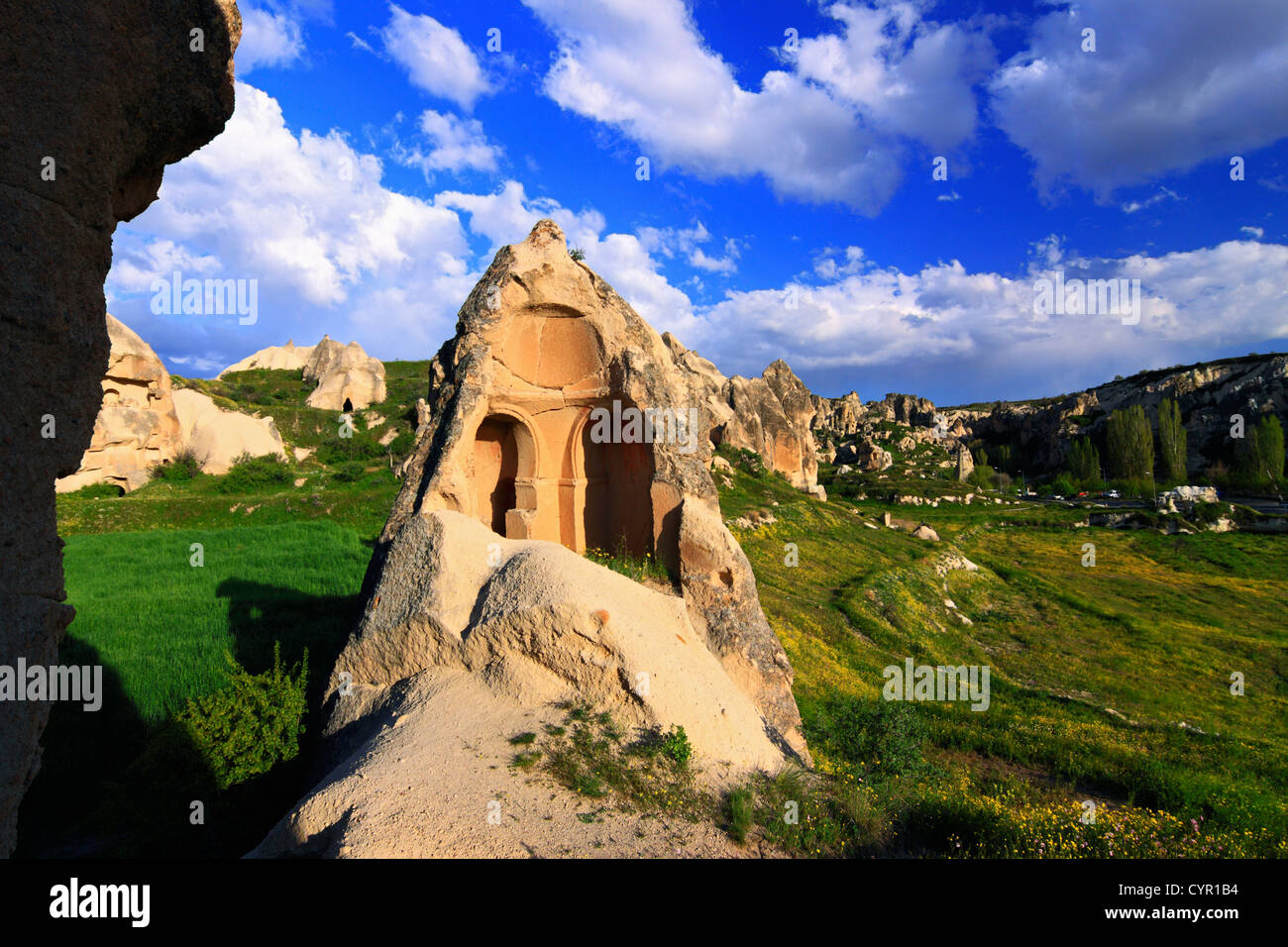 Cappadocia landscape with broken fairy chimney church in foreground ...