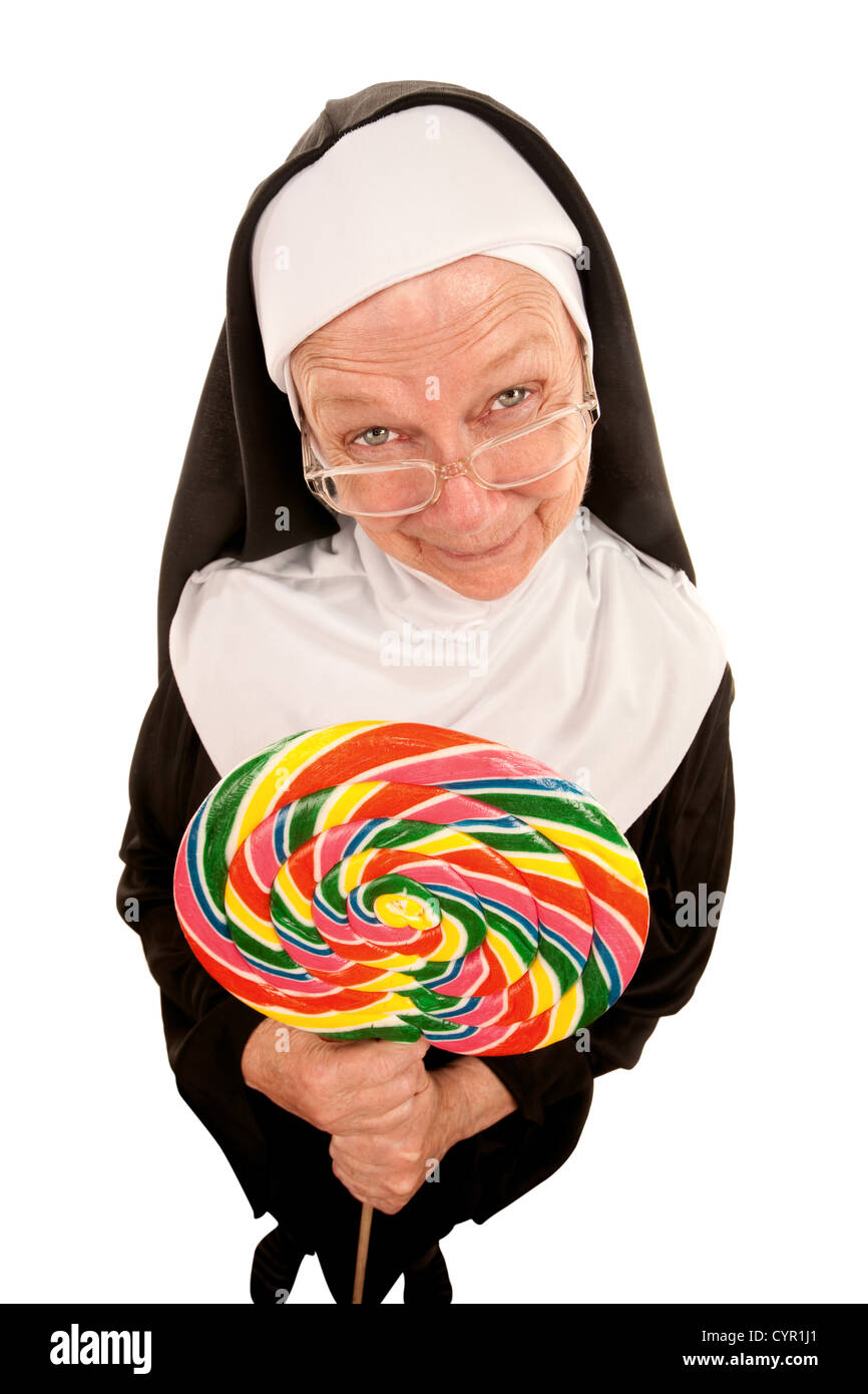 Funny nun on white background with colorful lollipop Stock Photo - Alamy