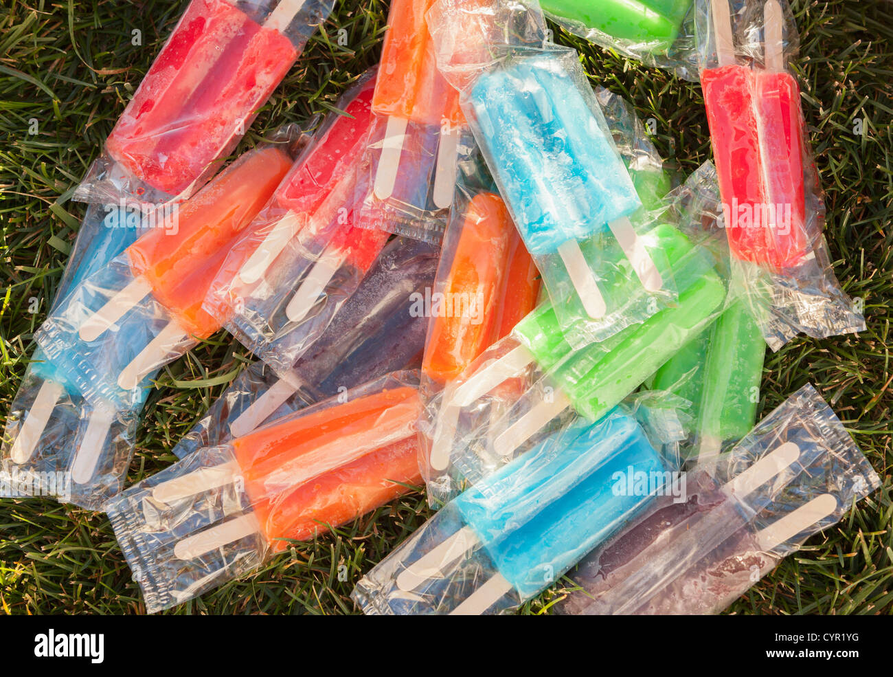 Frozen popsicles on the grass Stock Photo - Alamy