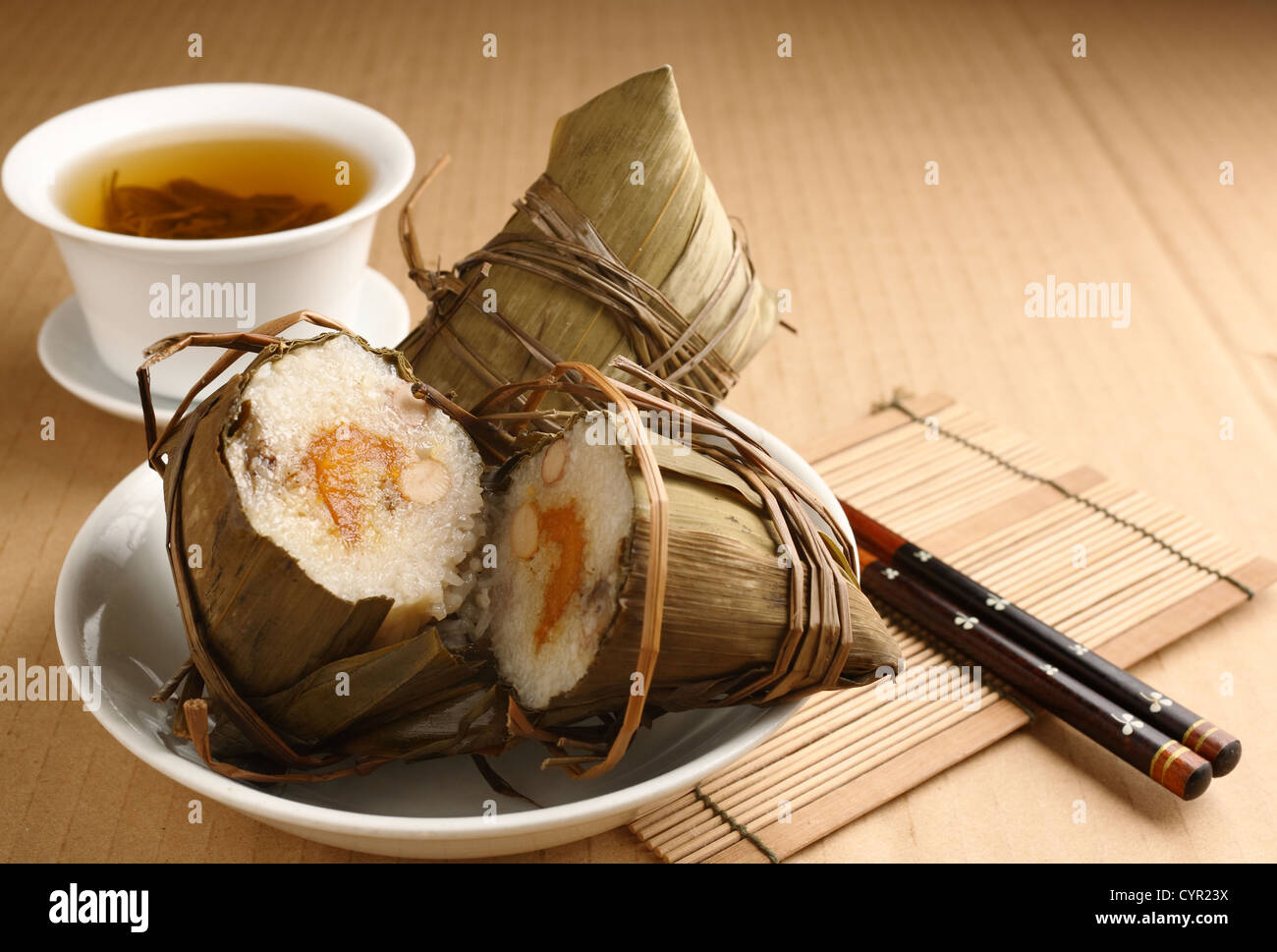 Rice dumplings with tea Stock Photo - Alamy