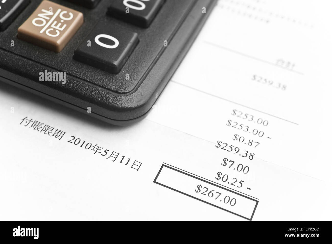 bill and calculator Stock Photo - Alamy