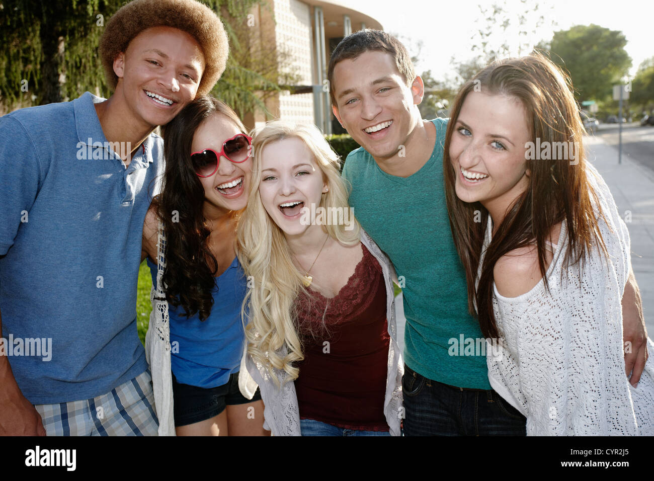 School friends standing together Stock Photo - Alamy
