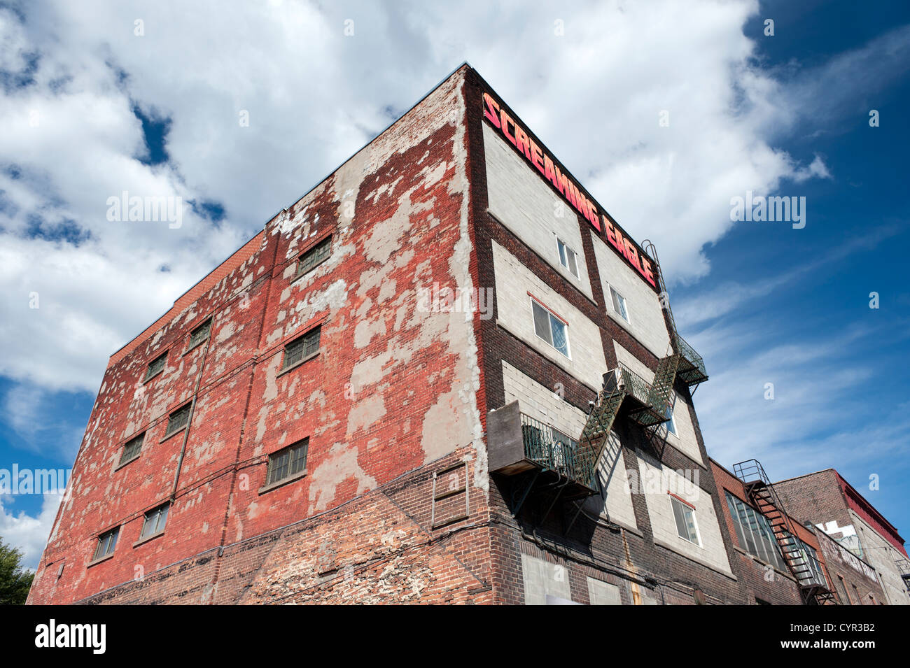 Old building with ragged brick wall in Montreal, province of Quebec ...