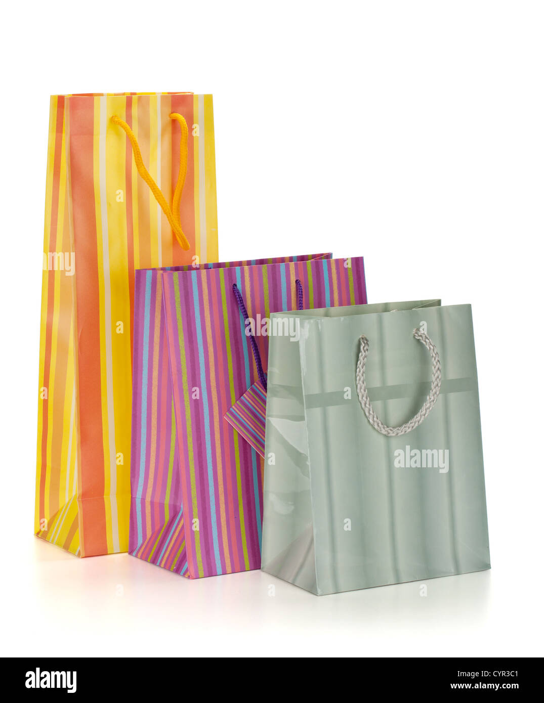 Three shopping bags. Isolated on white background Stock Photo - Alamy