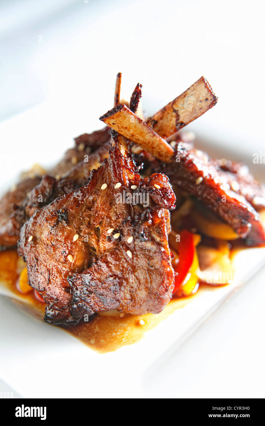 Mutton chop with sesame in the dish Stock Photo - Alamy