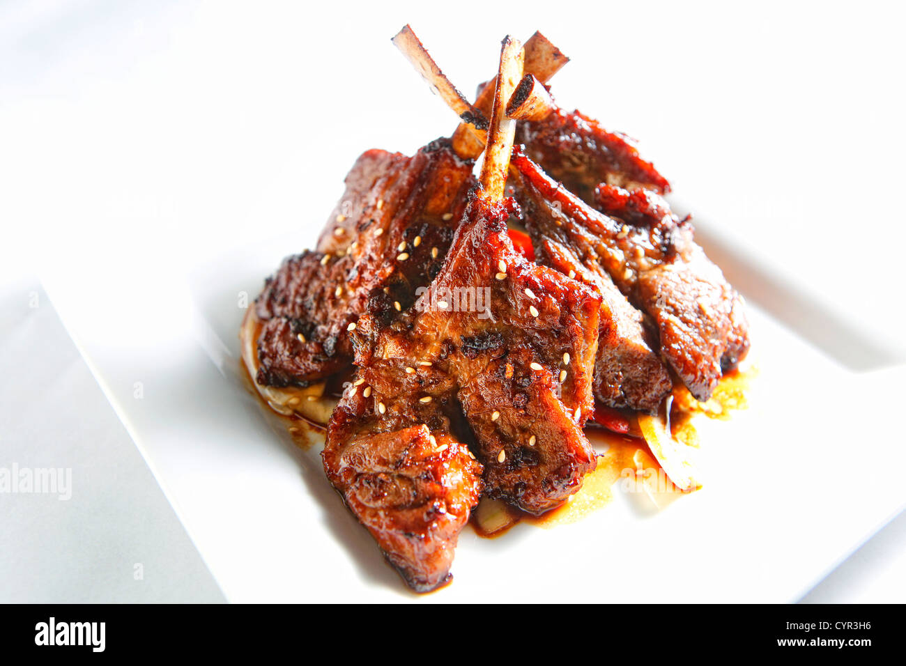Mutton chop with sesame in the dish Stock Photo - Alamy