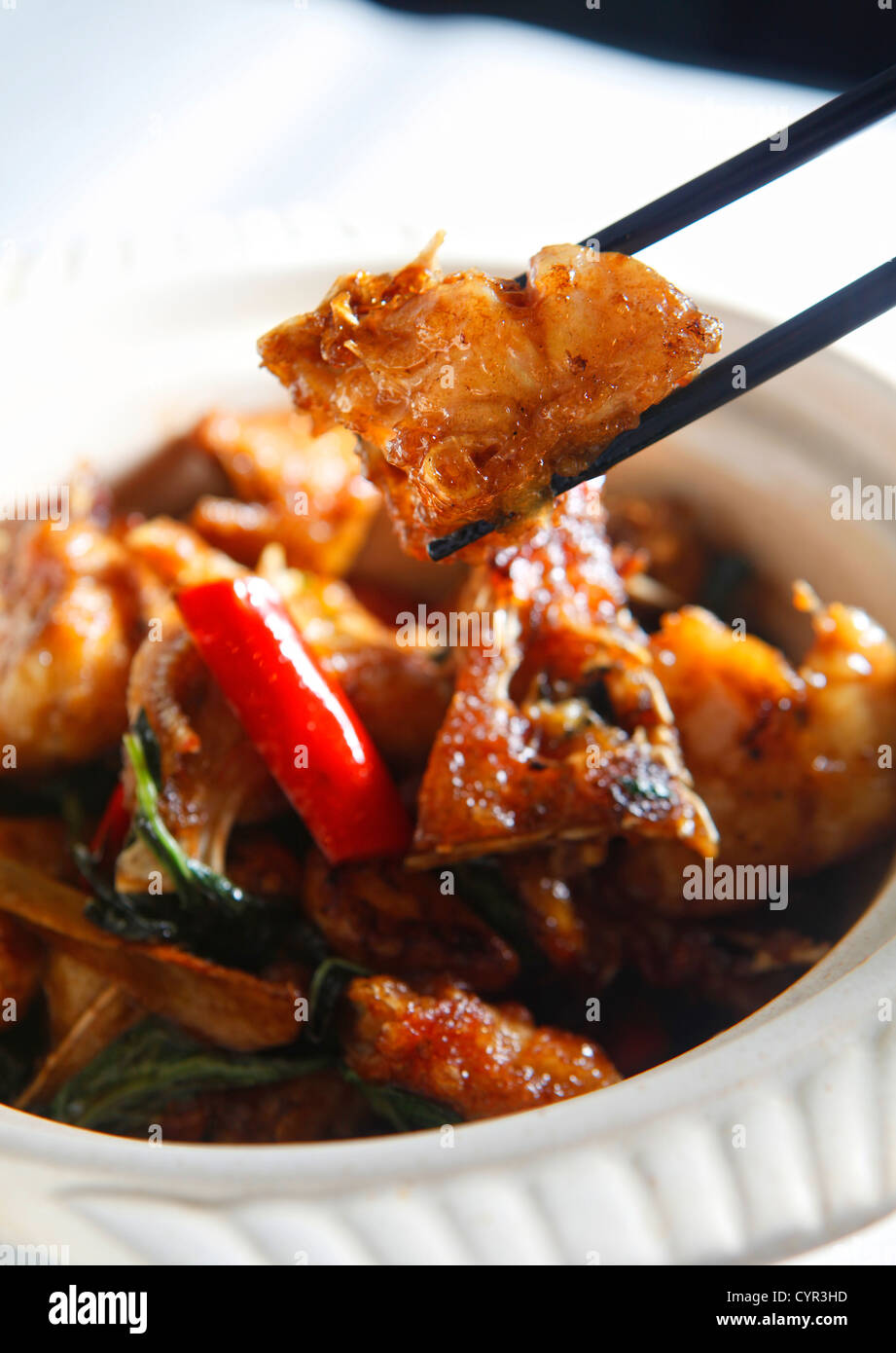Fish with chili pepper in the bowl Stock Photo - Alamy