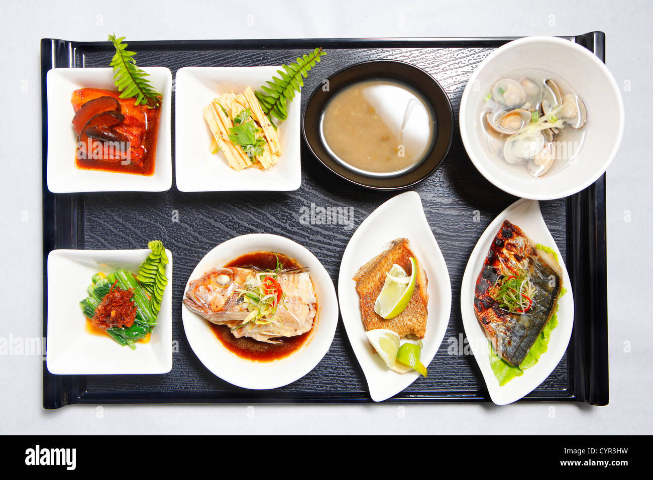 Fish meal with appetizer and soup in the dish Stock Photo - Alamy