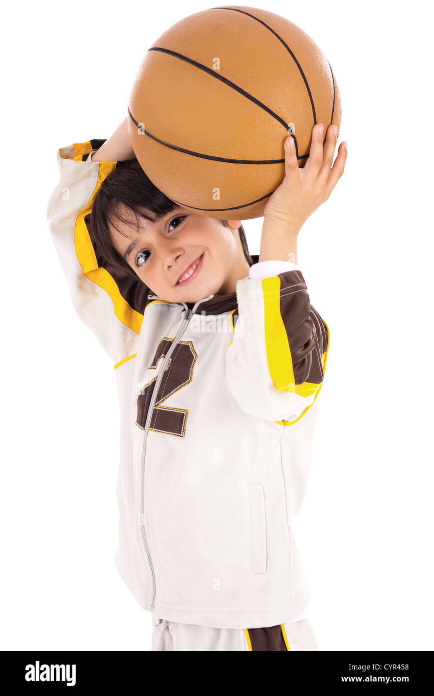 Little kid while throwing the basketball on white isolated background ...