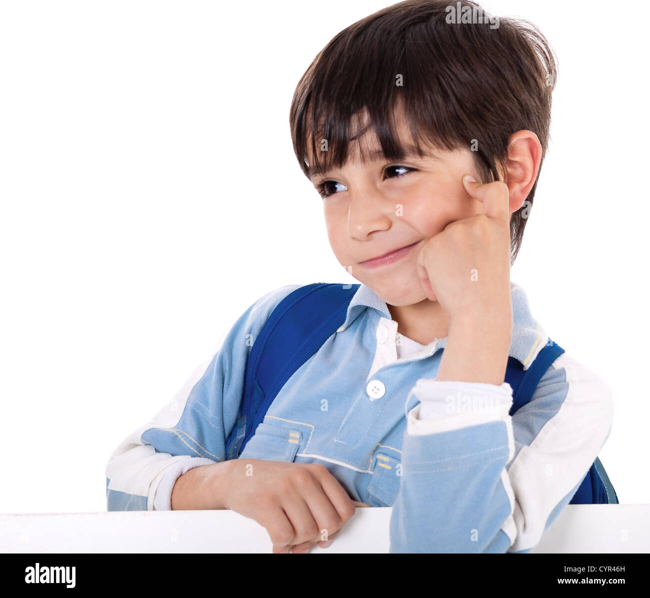Portrait of a adorable school boy thinking on white isolated background ...