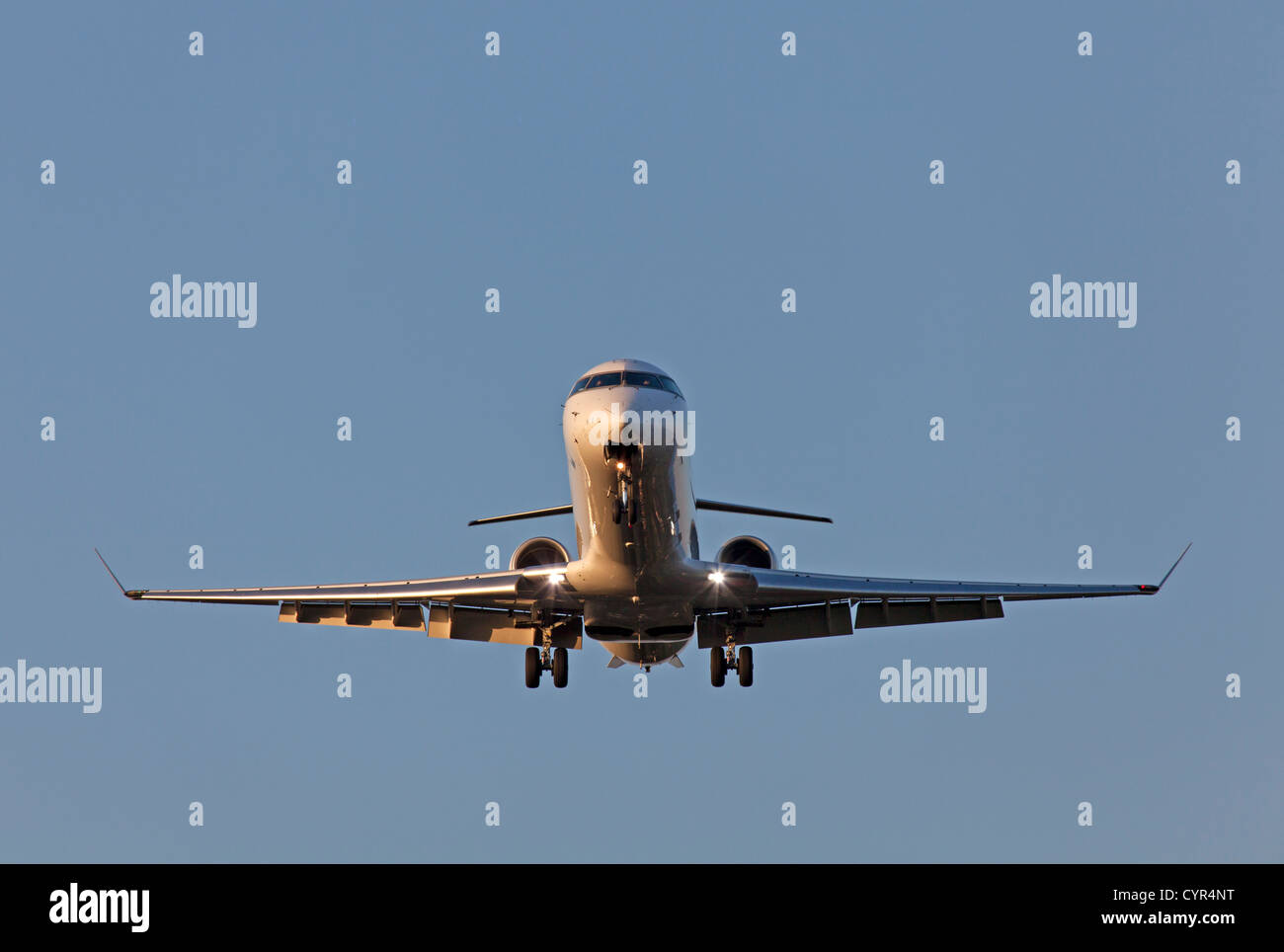 Front of a landing airplane Stock Photo - Alamy