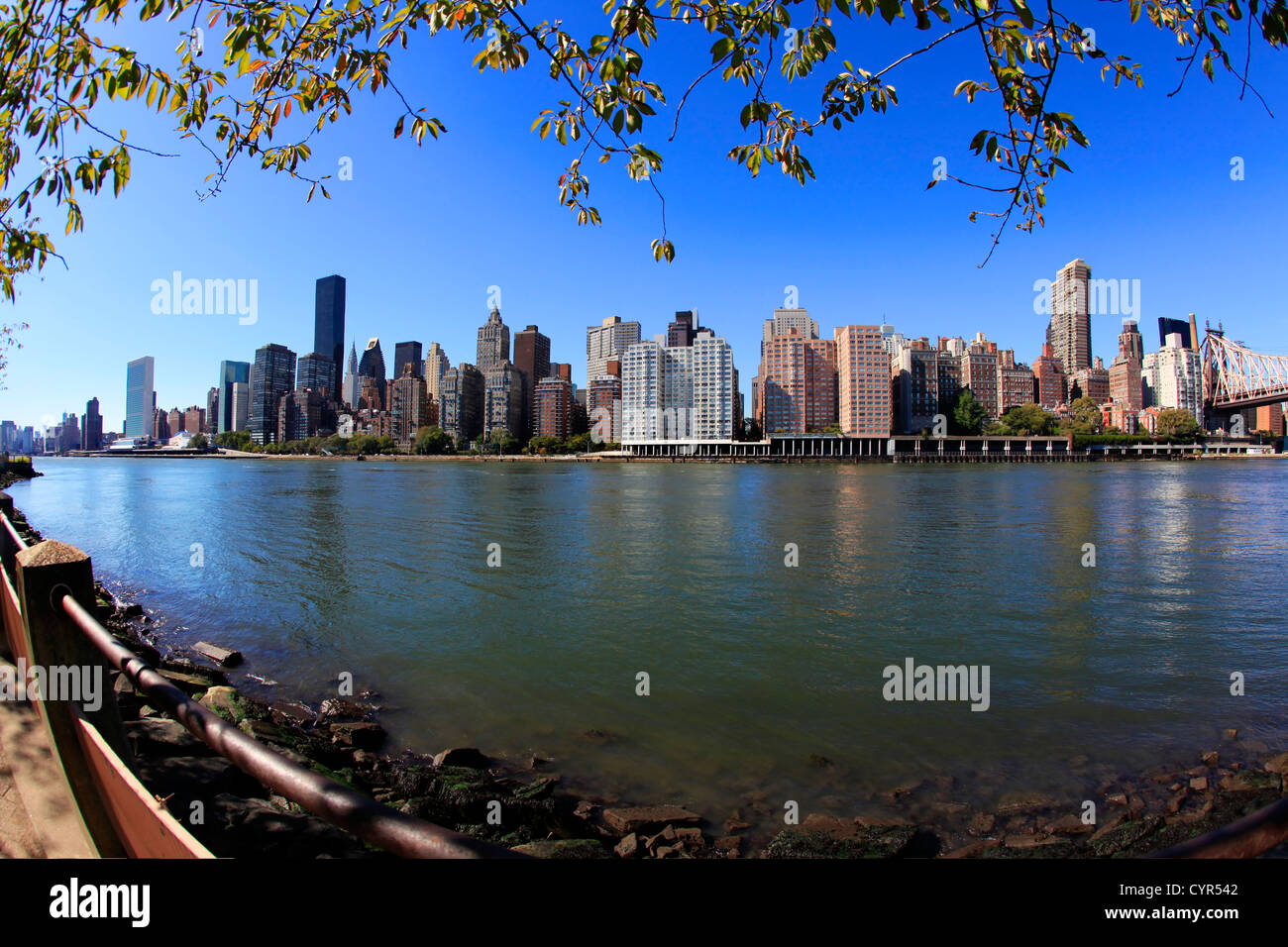 Midtown Manhattan with New York City skyline and Queensboro Bridge over East River Stock Photo ...