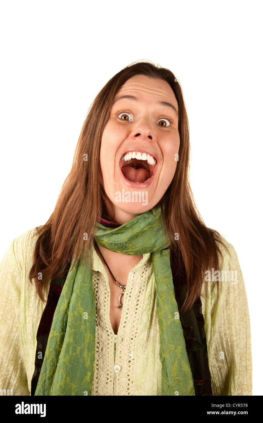 Pretty woman in green laughing out loud Stock Photo - Alamy