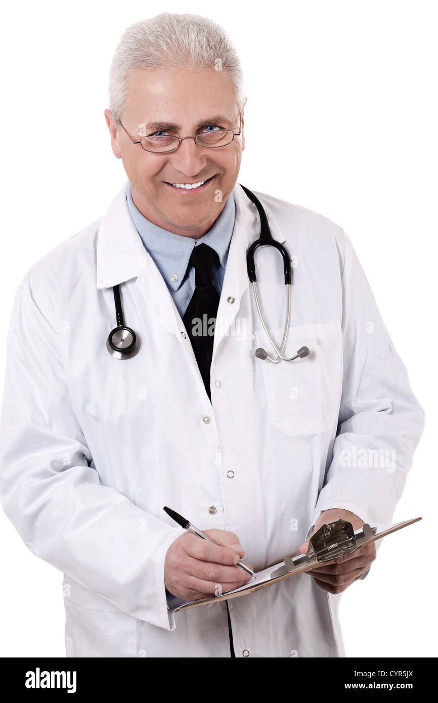 Portrait of senior doctor writing reports isolated on white background ...