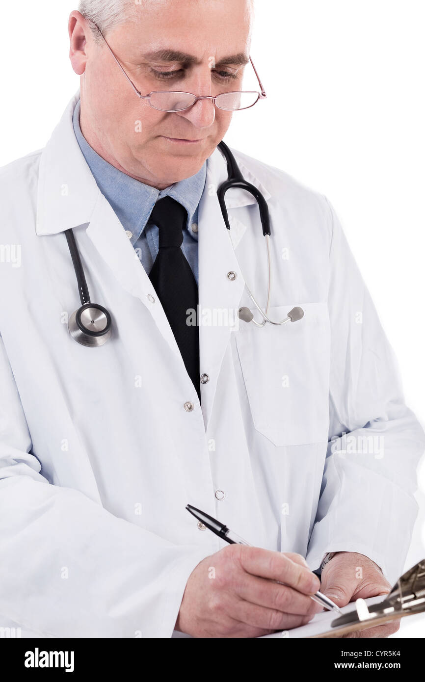 Doctor making his notes over white background Stock Photo - Alamy