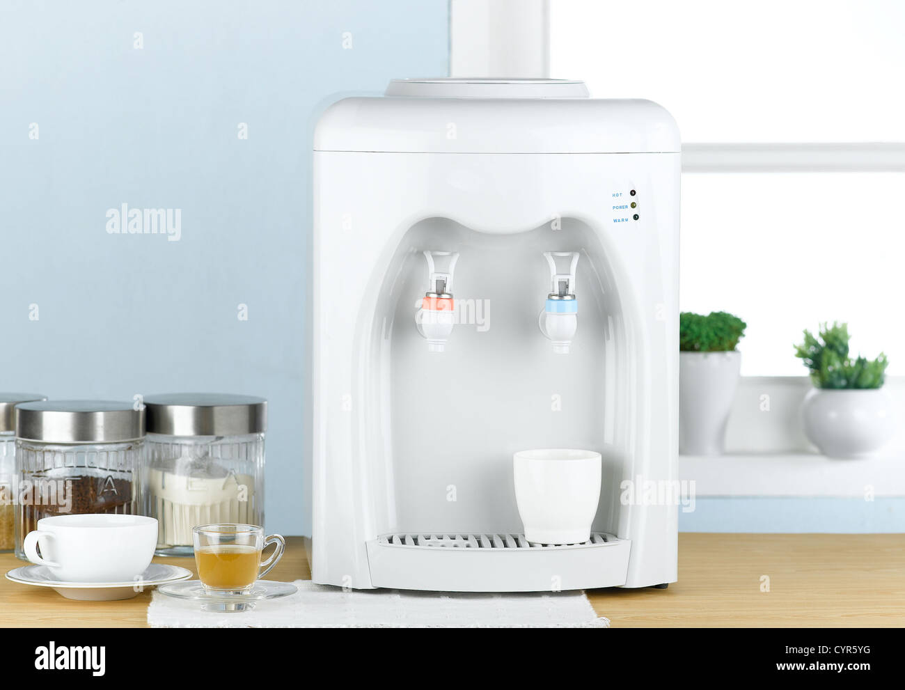 Two in one hot and cool water drinking machine Stock Photo - Alamy