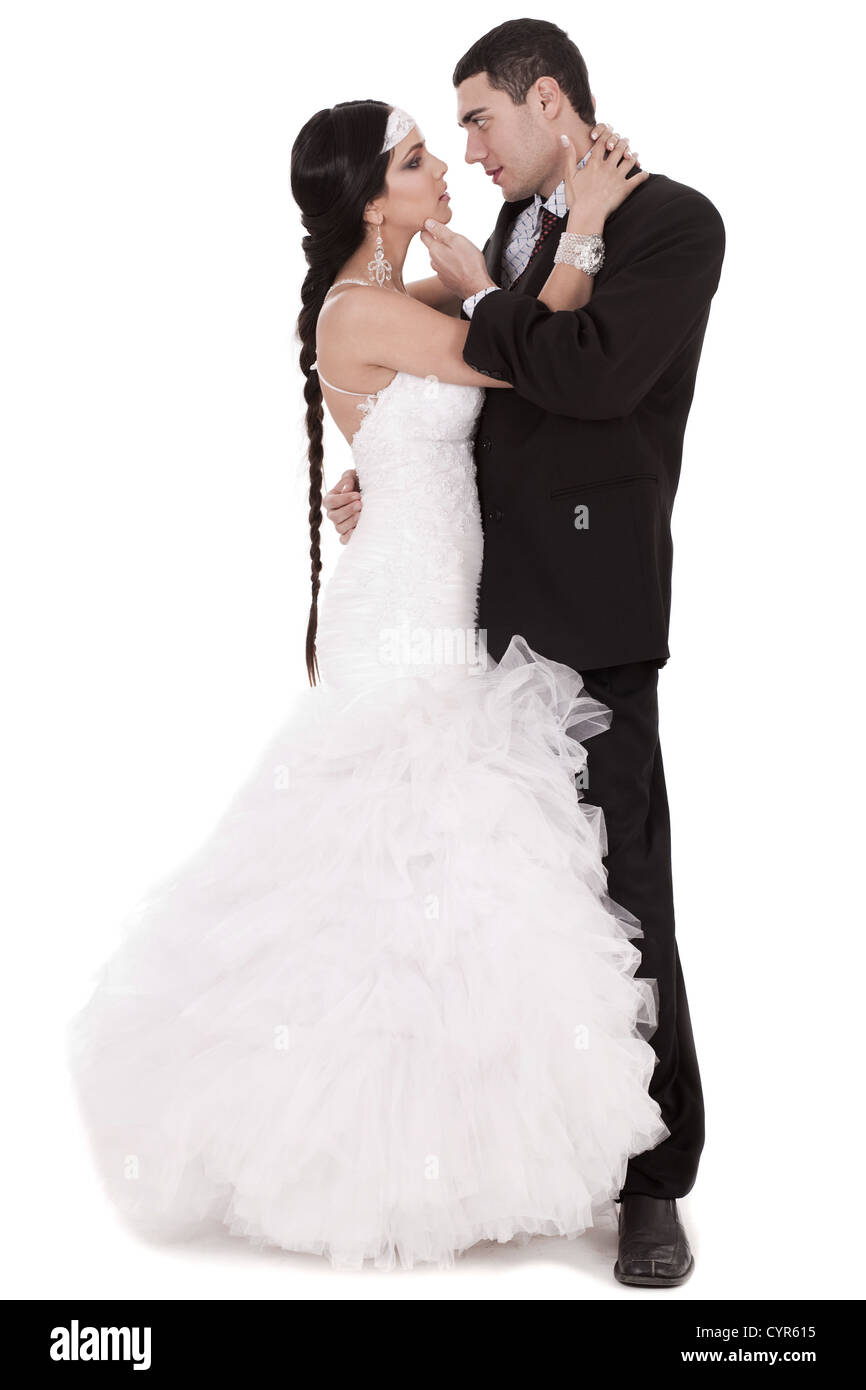 Newly married couple loving each other over white background Stock ...