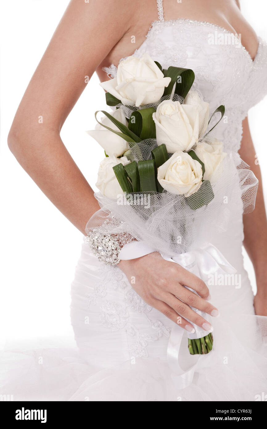 Bride with bunch of white roses in white background Stock Photo - Alamy