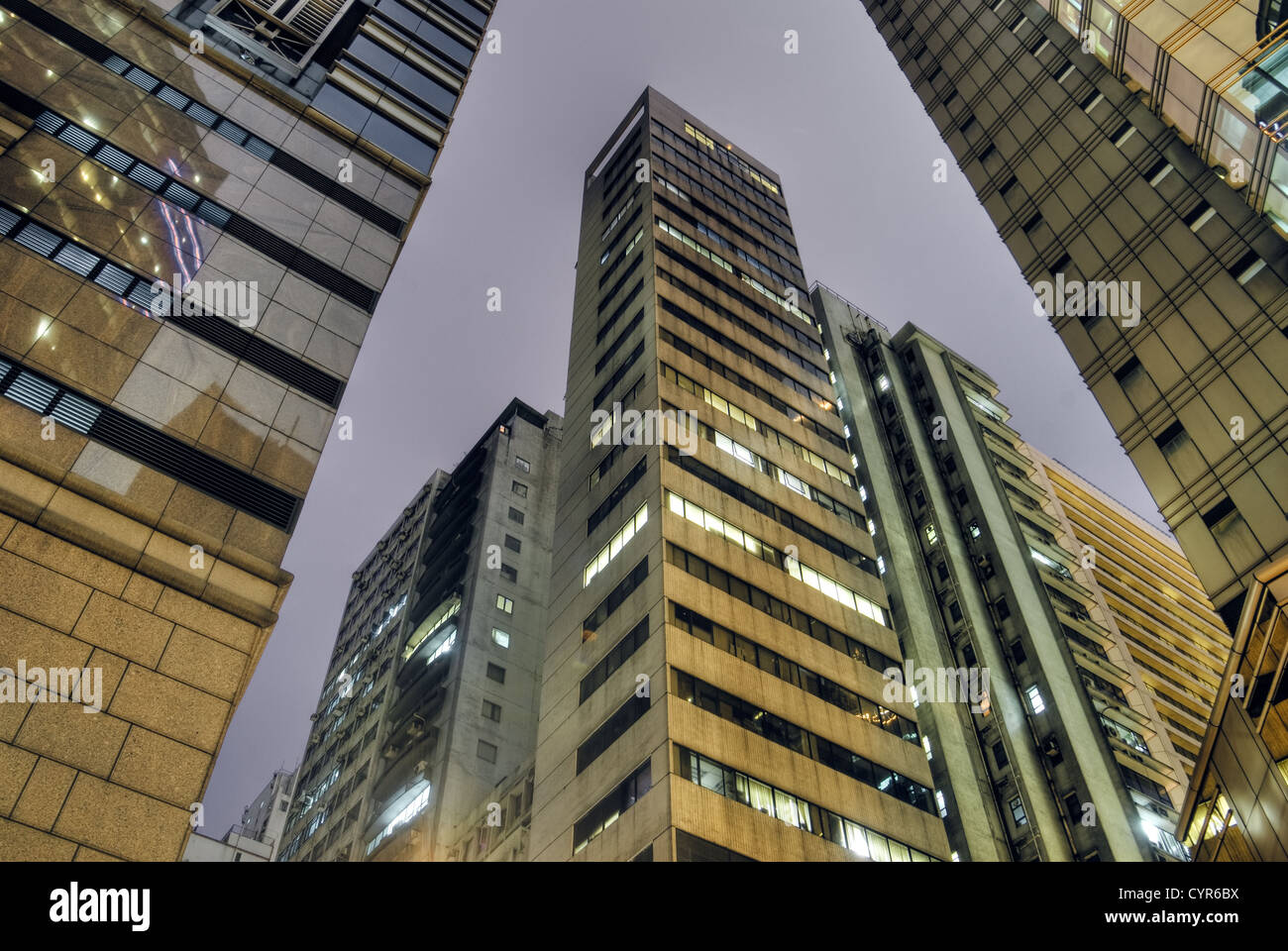 Skyscraper tower of tall in night with yellow color Stock Photo - Alamy