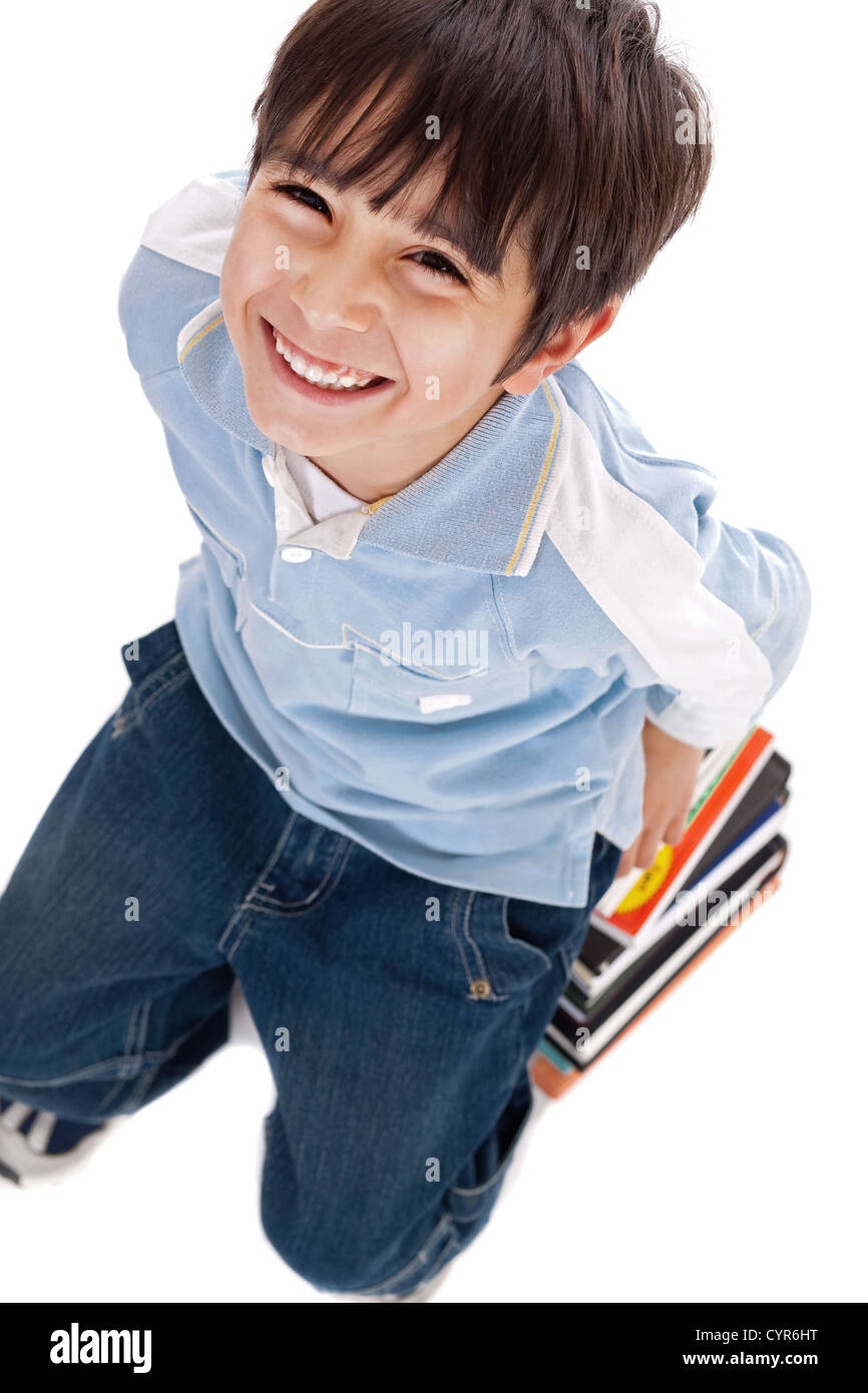 Top view of cute kid with books over white background Stock Photo - Alamy