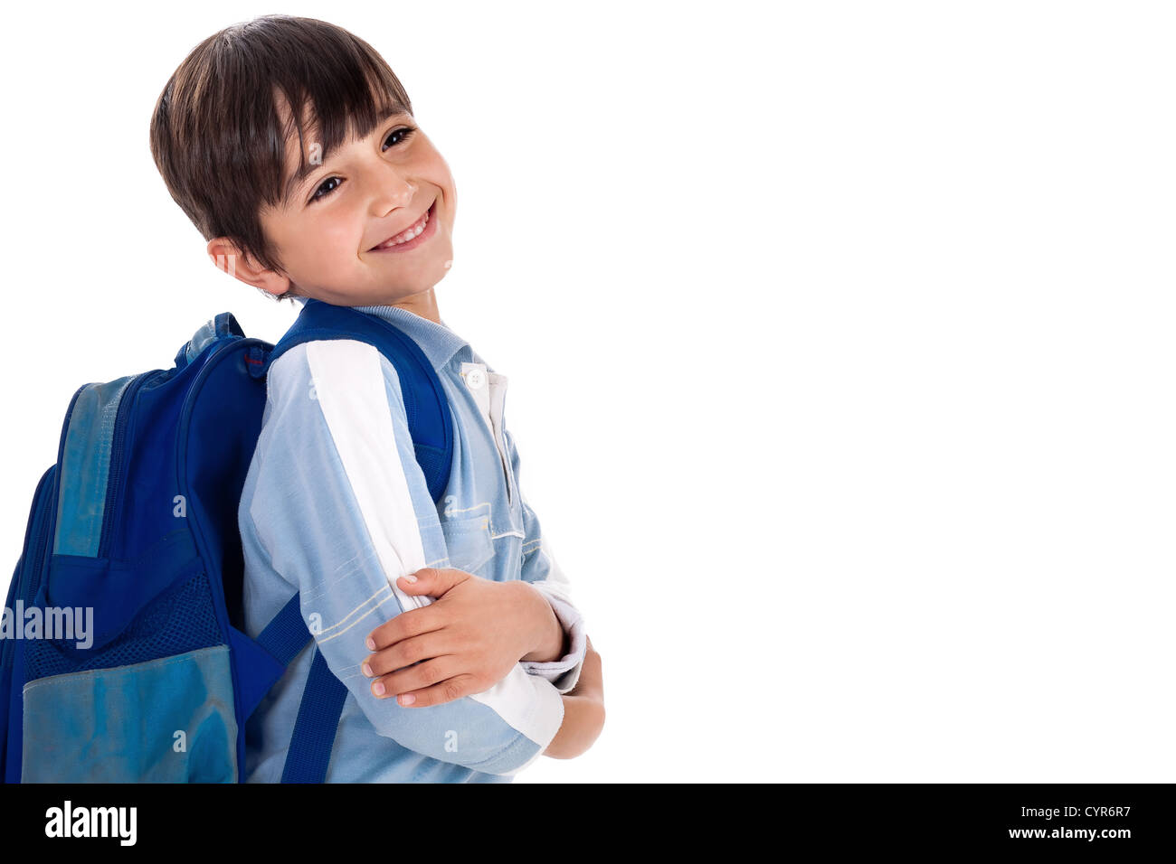 Happy young boy ready for school with his bag on isolated white ...