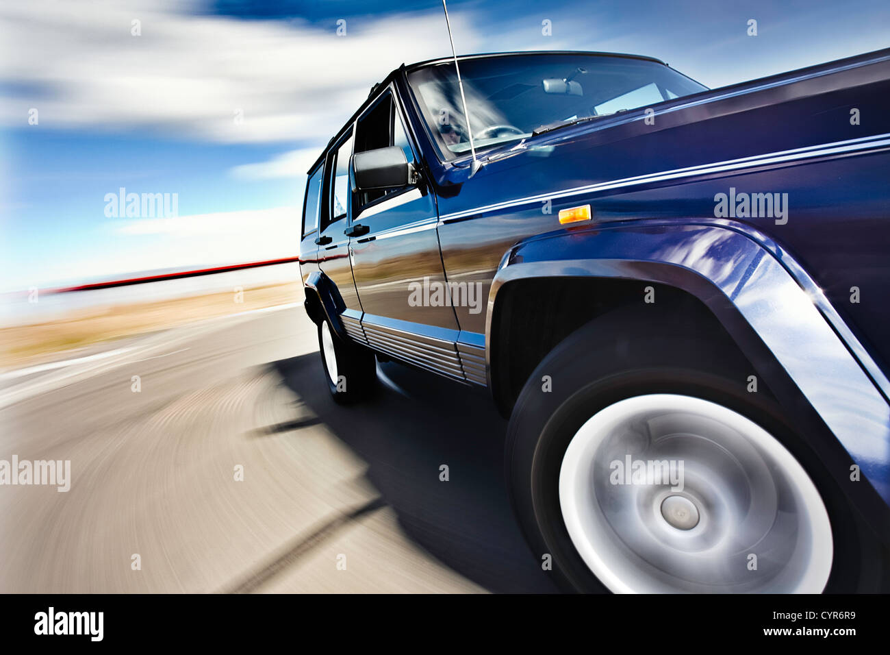 4x4 suv car speeding around a corner Stock Photo - Alamy