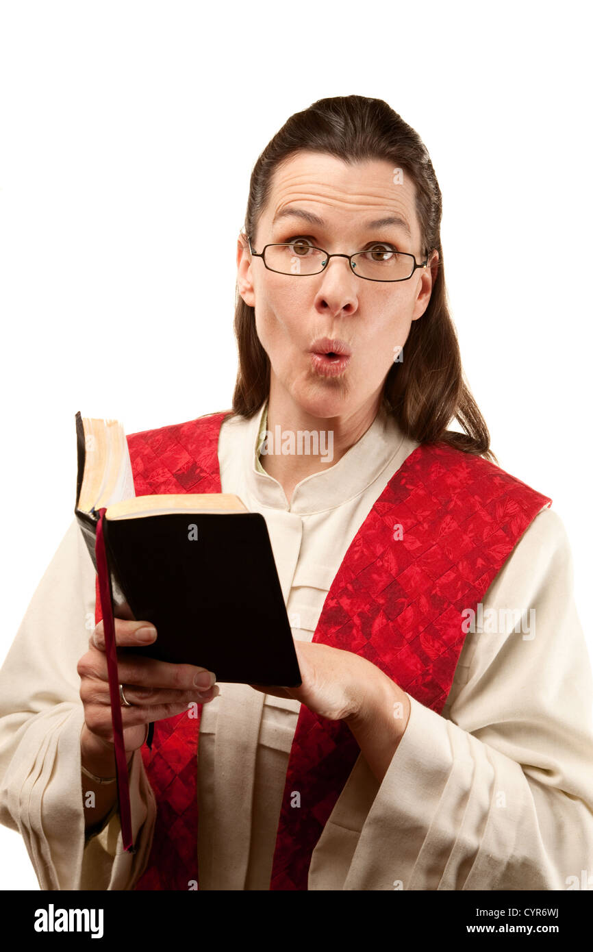 pretty female pastor finding something shocking in the Bible Stock ...