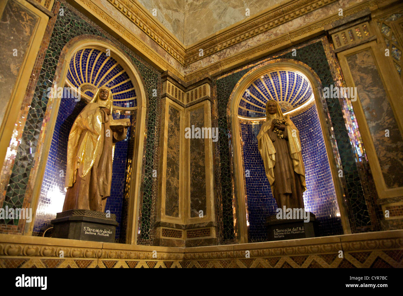 sacred statues inside church of segovia spain Stock Photo - Alamy