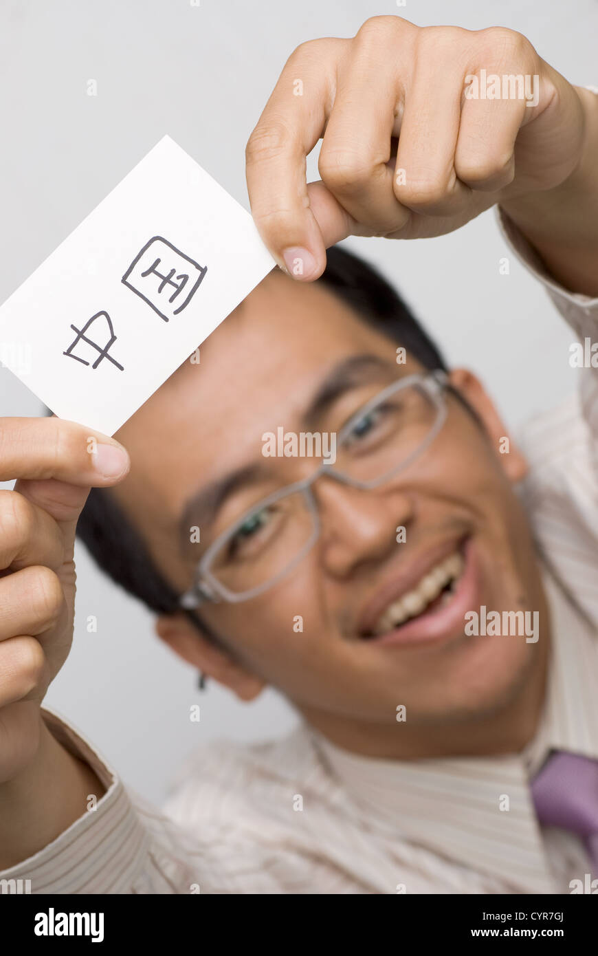 Business man travel to China for work. Card write on Chinese words ?V ...