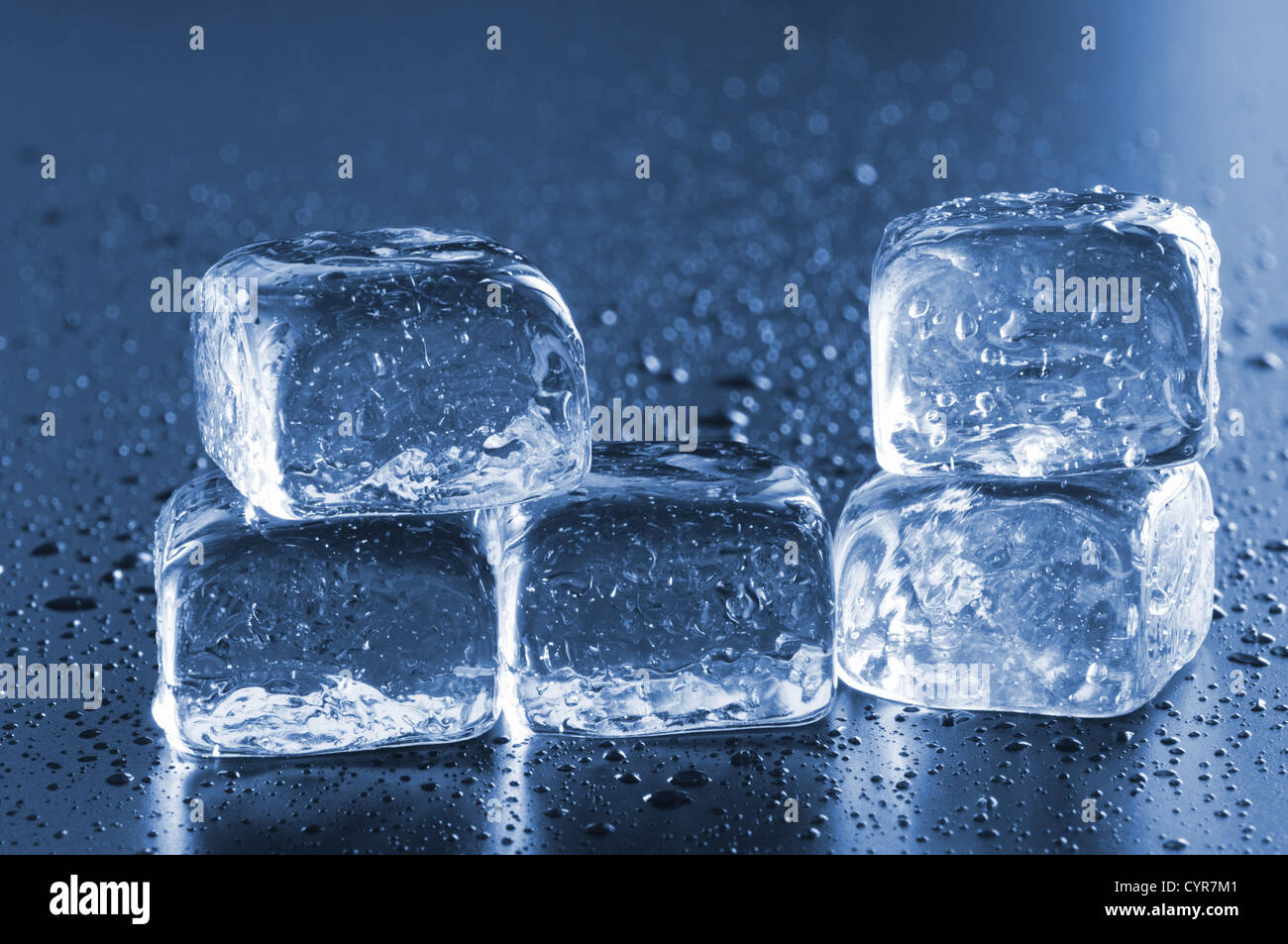 ice cube macro in blue with water drops Stock Photo - Alamy