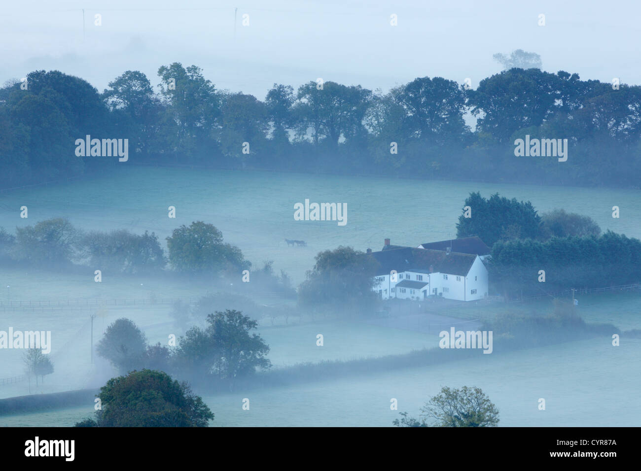 House in Mist. UK Stock Photo - Alamy