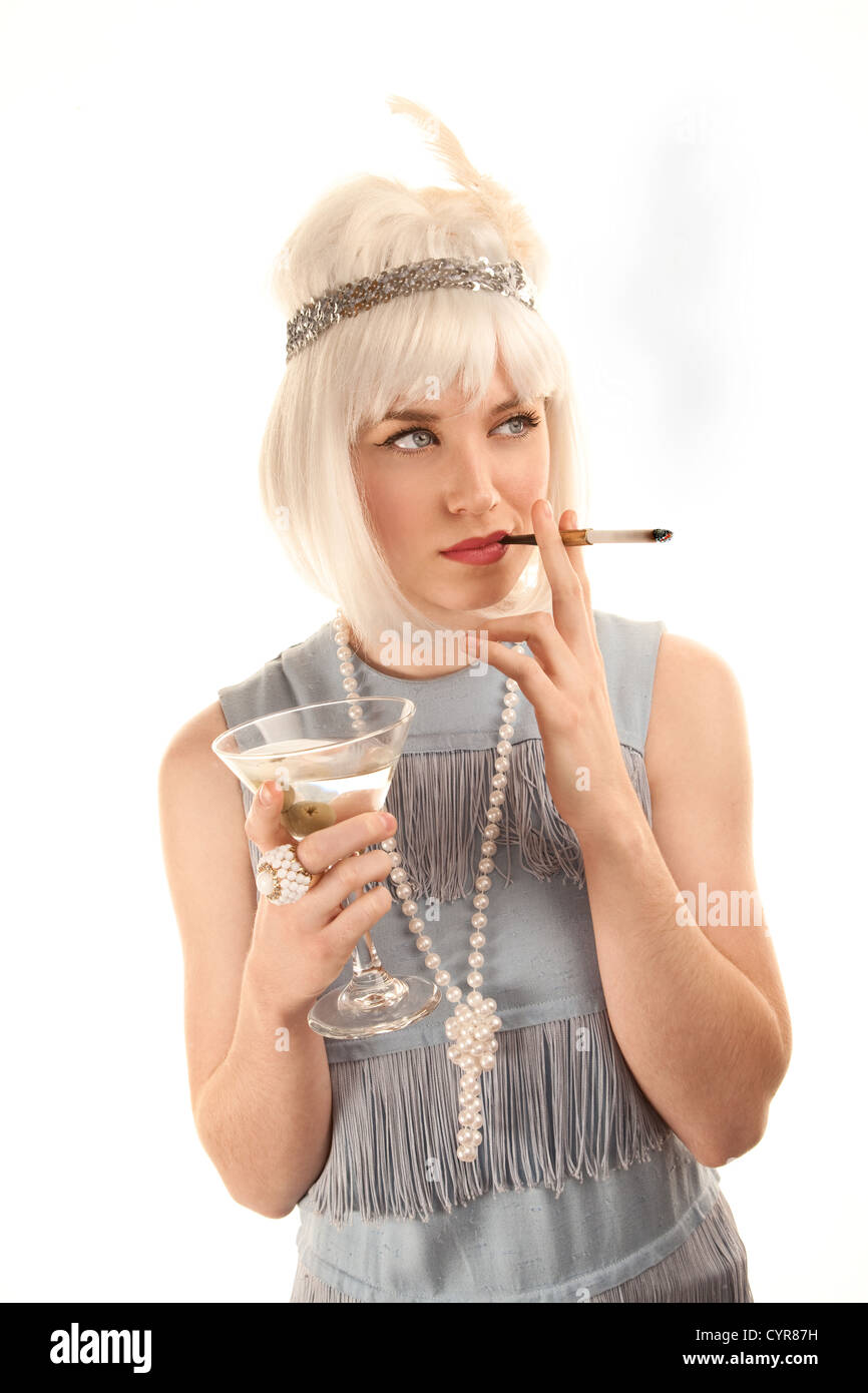 Pretty woman in vinatge 1920s flapper dress Stock Photo - Alamy