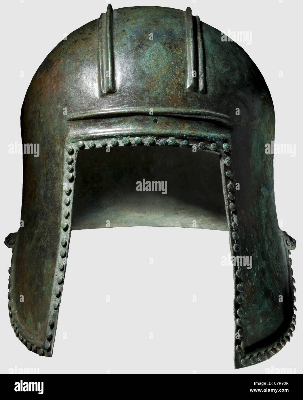 An Illyrian type helmet,7th/6th century B.C. Bronze. The skull with a ...