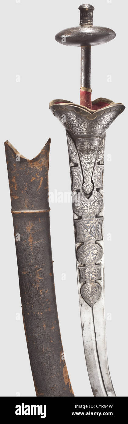 A South Indian ritual sword,19th century The blade curves forward and ...