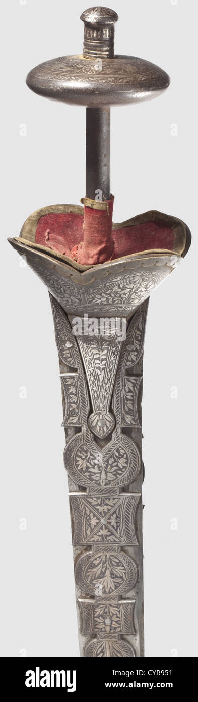 A South Indian ritual sword,19th century The blade curves forward and ...