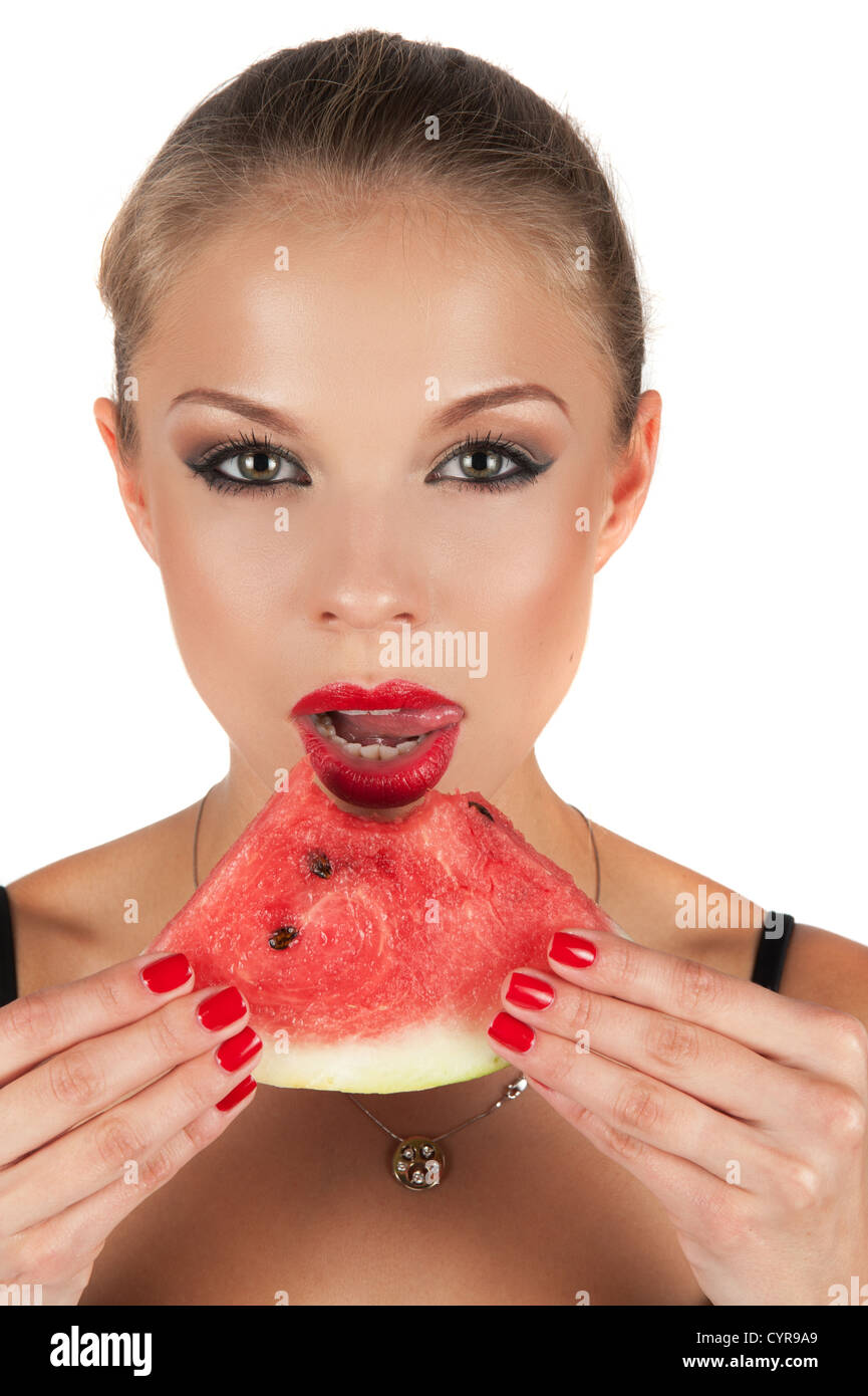 beautiful young woman eat juicy watermelon over white Stock Photo - Alamy