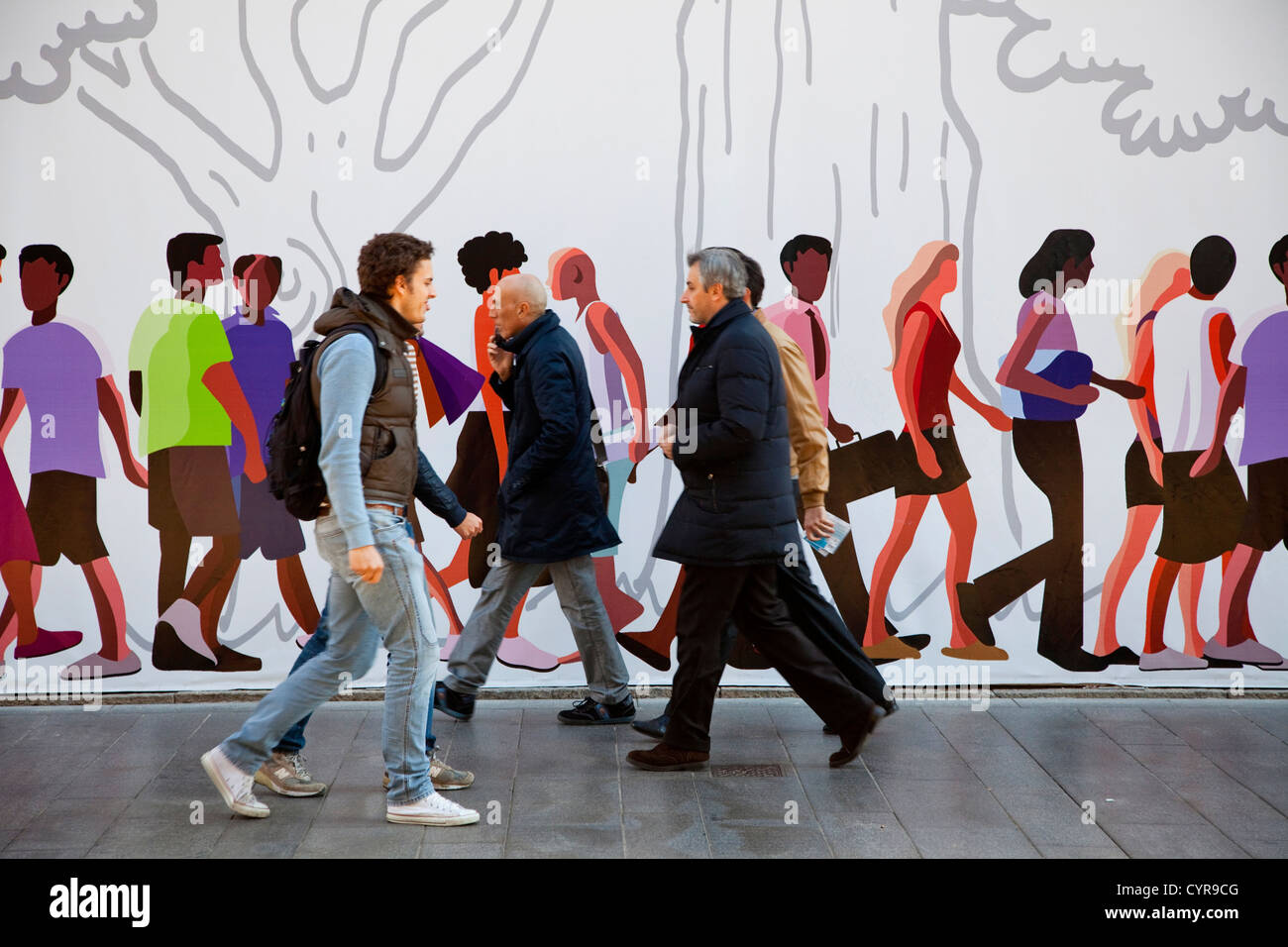 People walking in via Torino, famous street in Milan, Milano, Italy ...