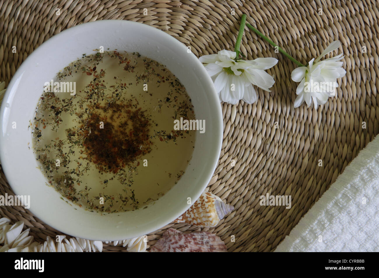 Spa design with herb and daisy Stock Photo - Alamy