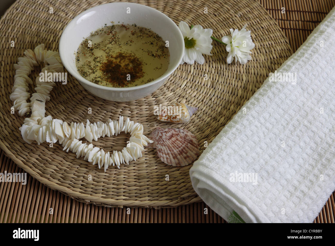 Spa design with herb and daisy Stock Photo - Alamy