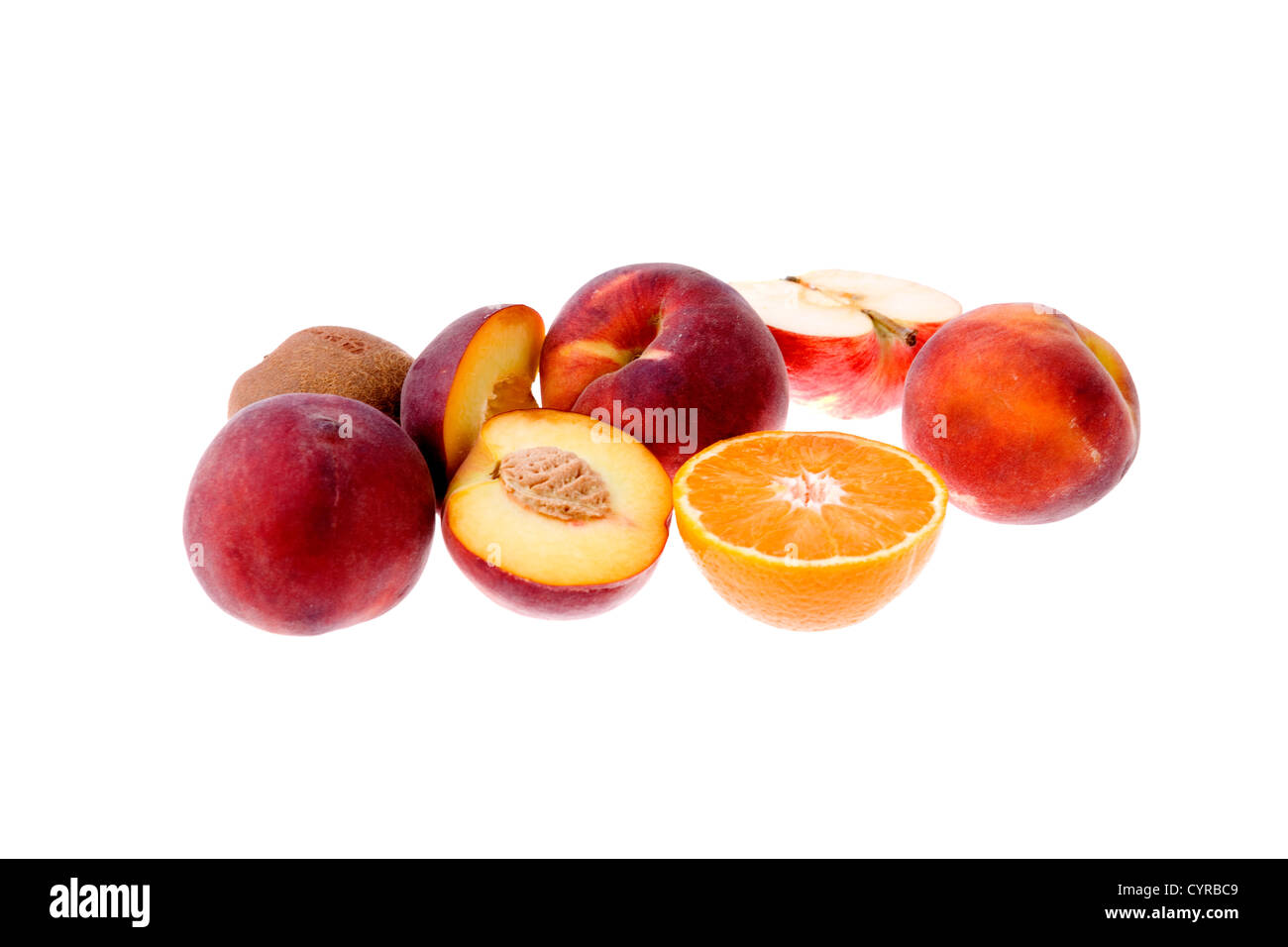some peaches and a orange isolated on white background Stock Photo - Alamy
