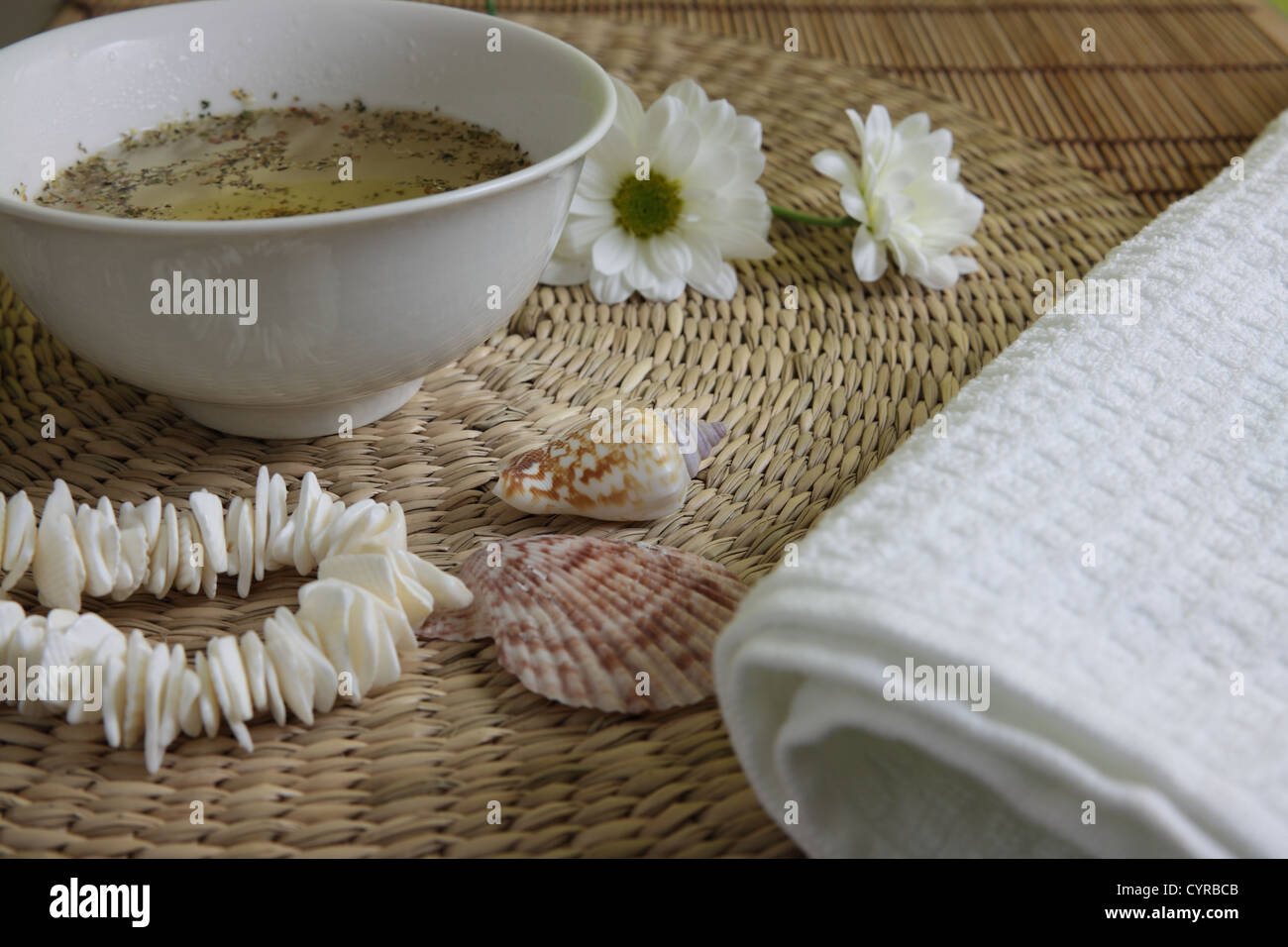 Spa design with herb and daisy Stock Photo - Alamy